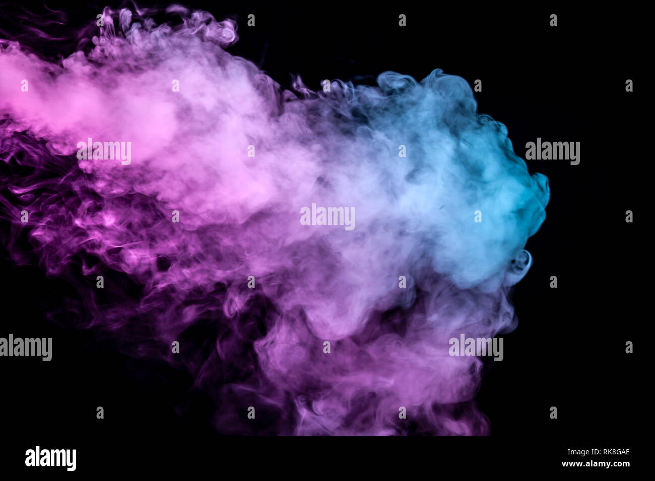 Translucent, thick smoke, illuminated by light against a dark ...