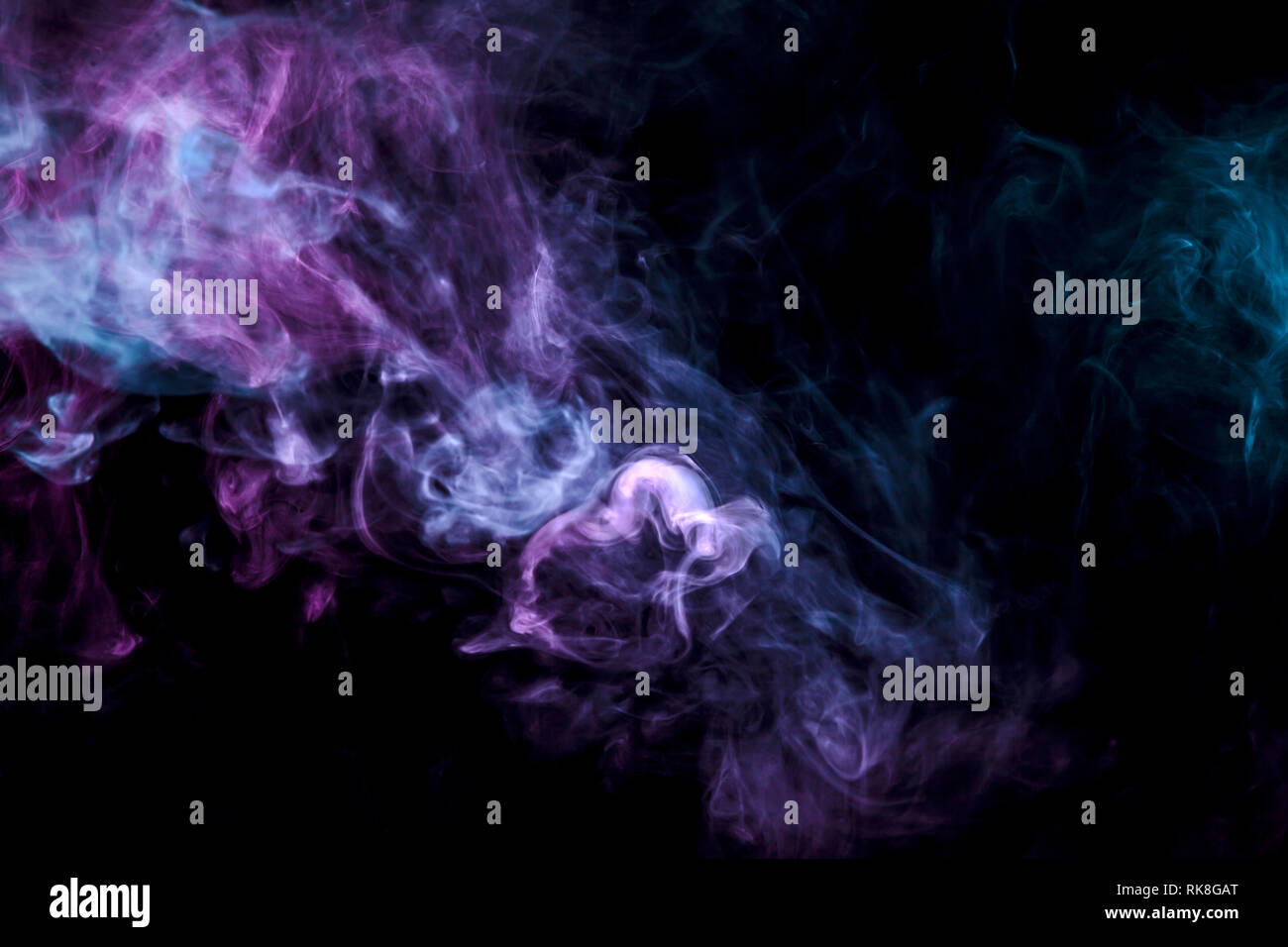 Translucent, thick smoke, illuminated by light against a dark ...