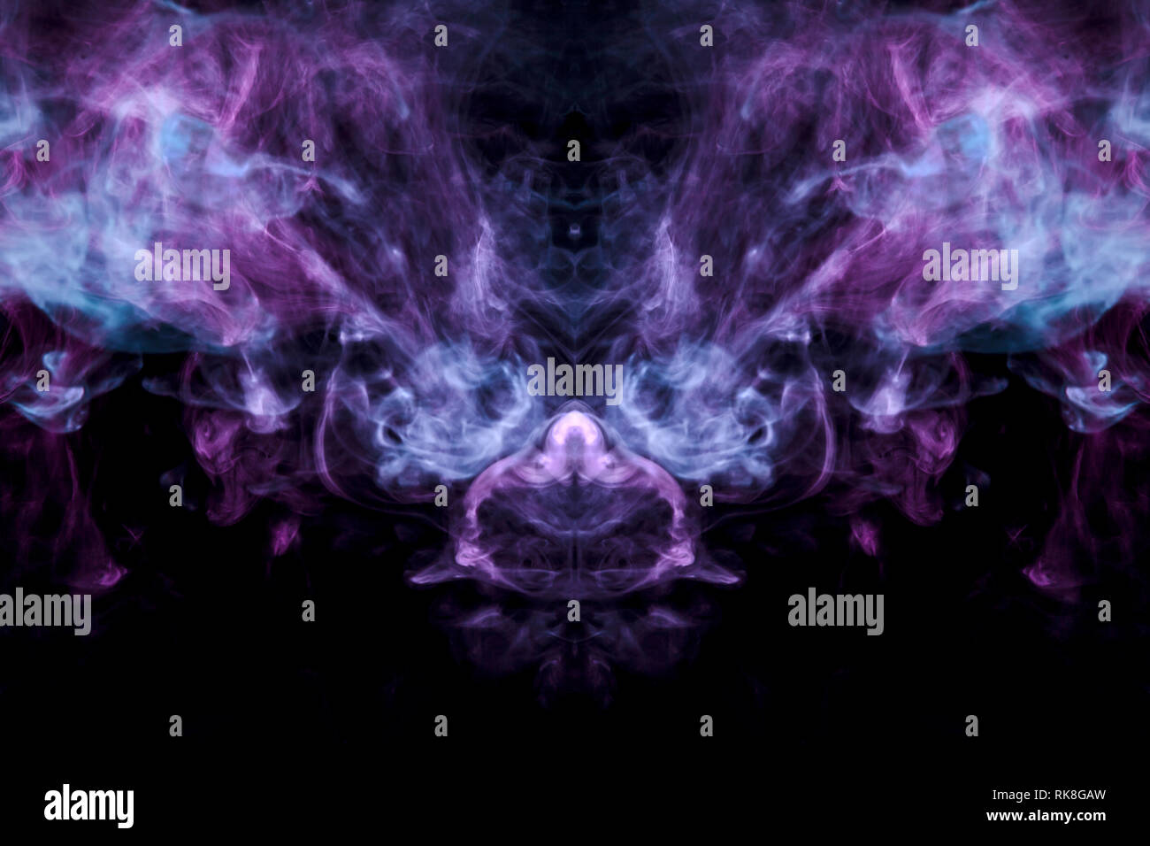 A multi-colored pattern of purple and blue smoke of a mystical shape in ...