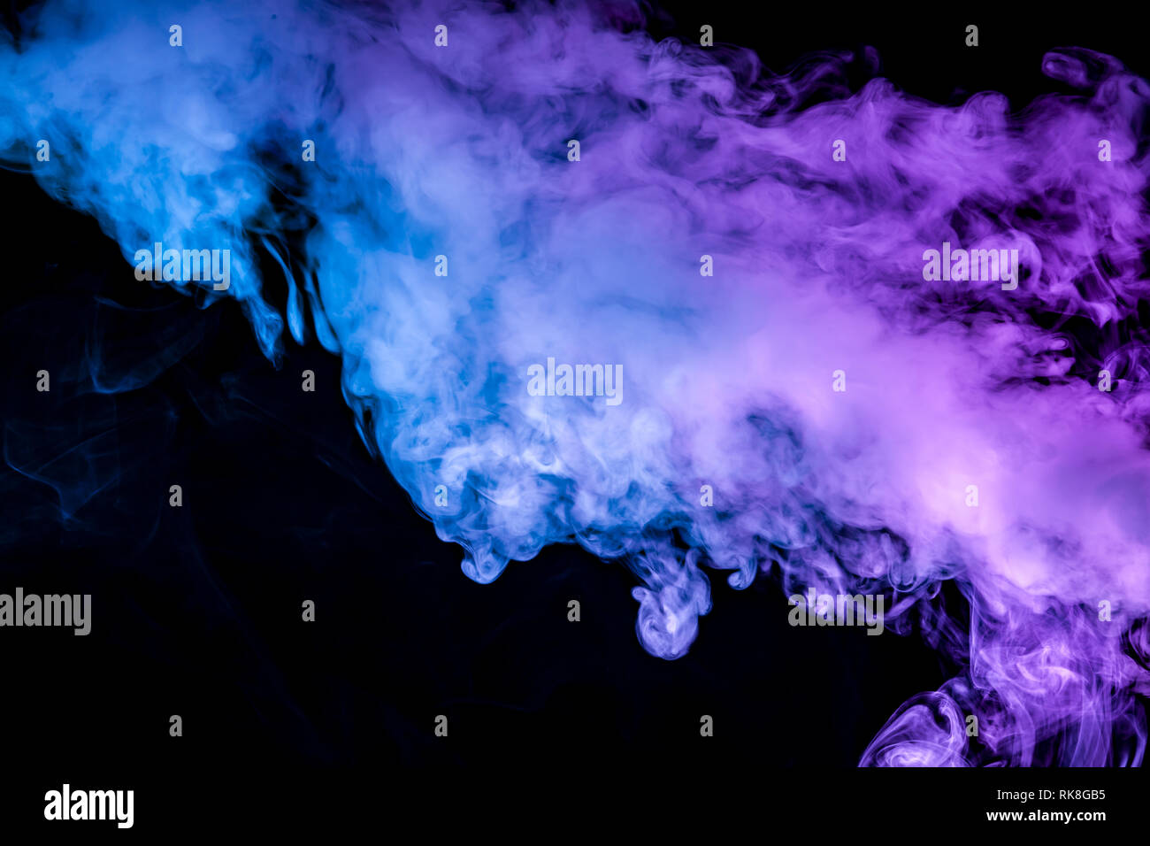 Translucent, thick smoke, illuminated by light against a dark ...