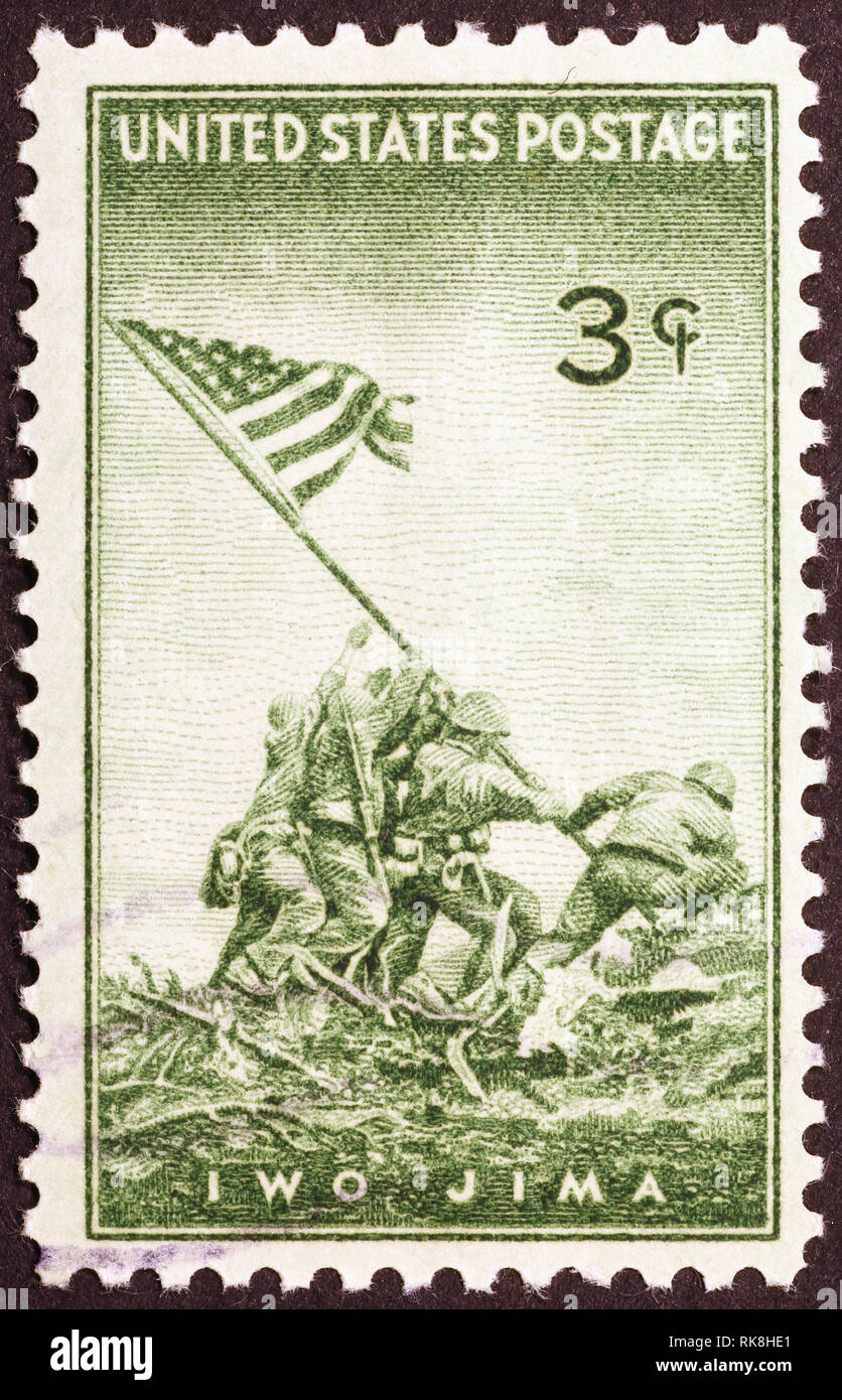 Marine corps in action at Ivo Jima in 1945. American postage stamp ...