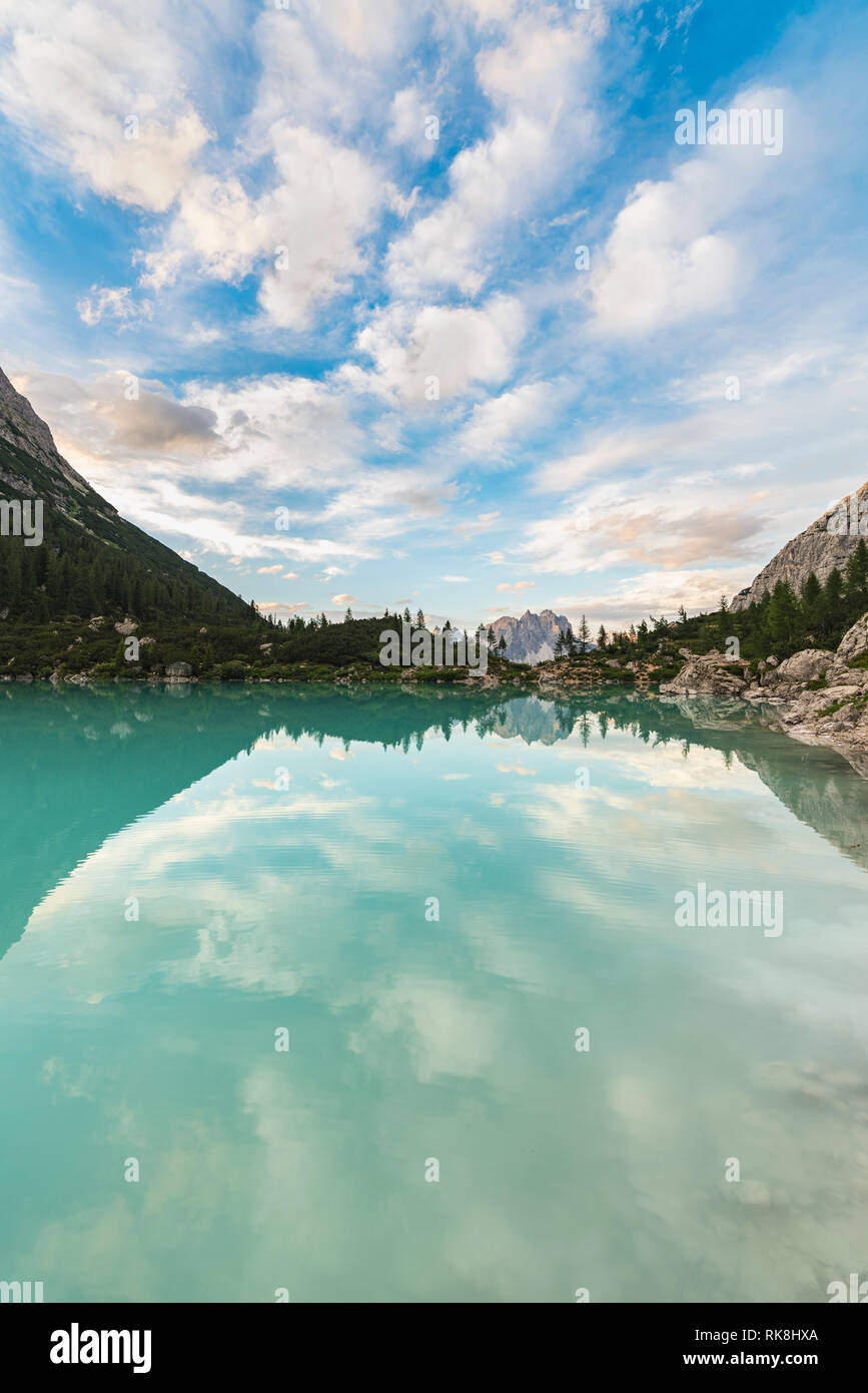 Reflection of Cadini di Misurina on Sorapis Lake at sunset in summer ...