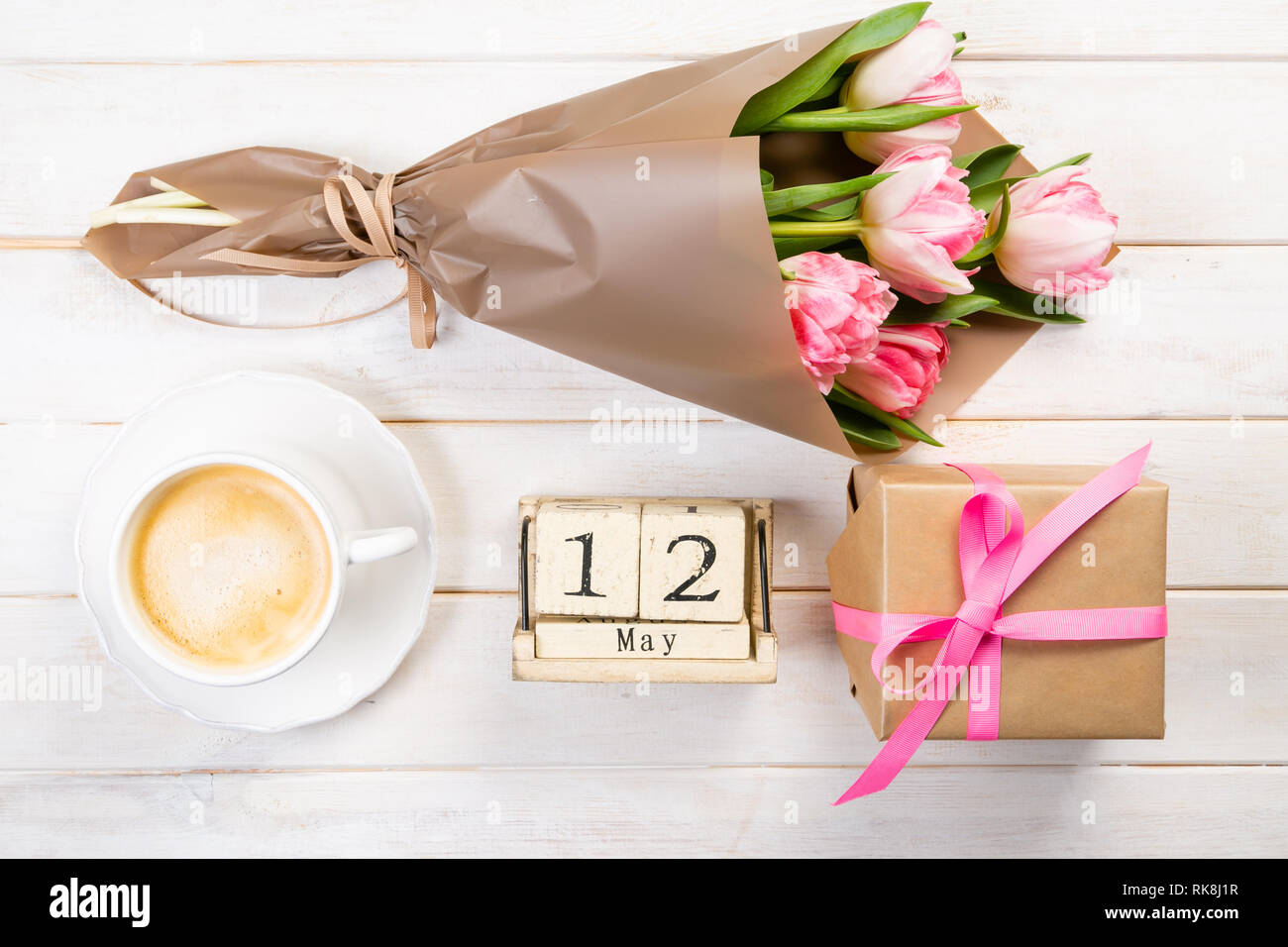 Mother's day concept - flowers, present, calendar Stock Photo - Alamy
