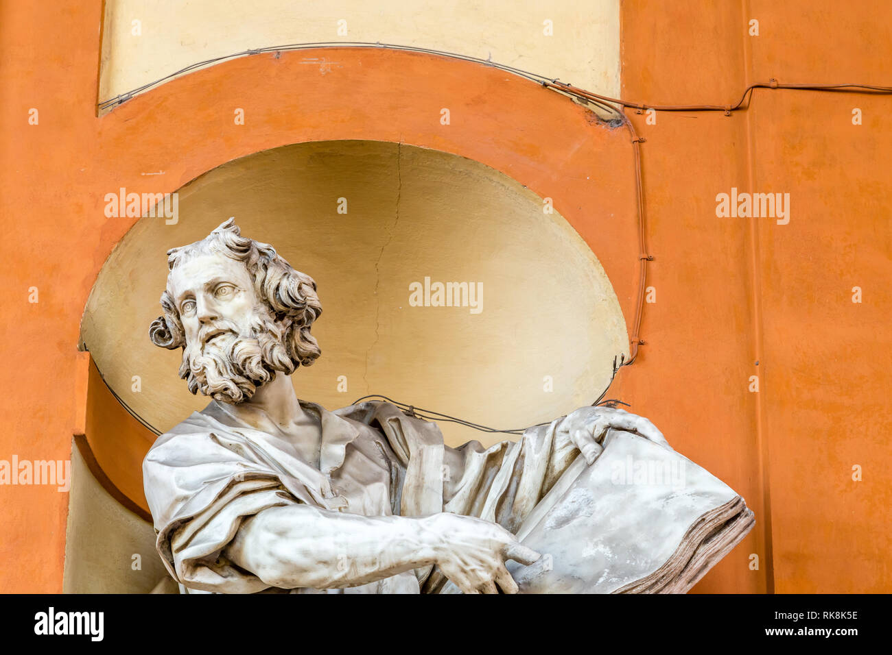 BOLOGNA, ITALY - DECEMBER 15, 2018: sunlight is enlightening statue of ...