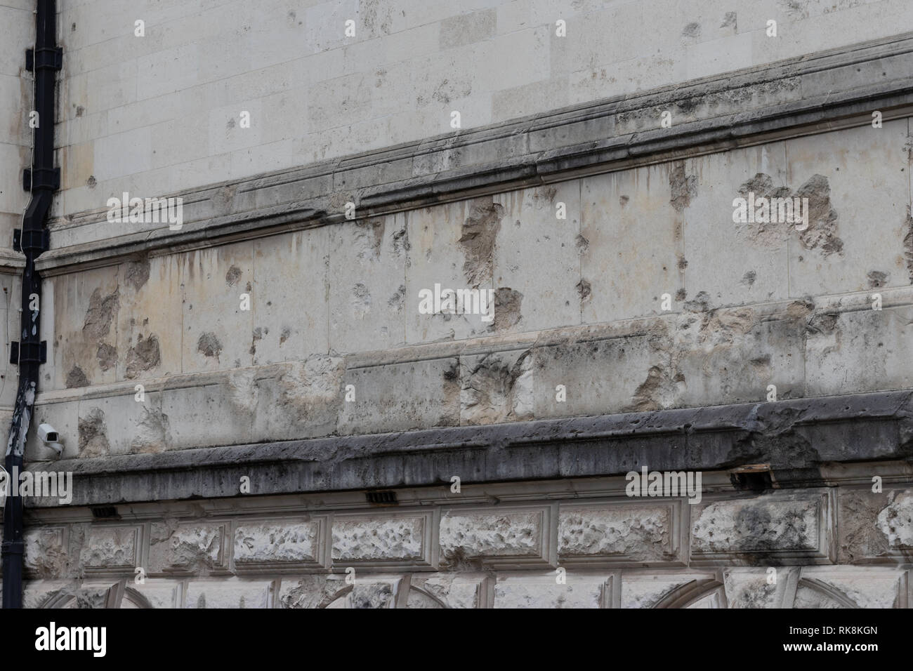 WW2 shrapnel damage visible on building still standing in London today ...