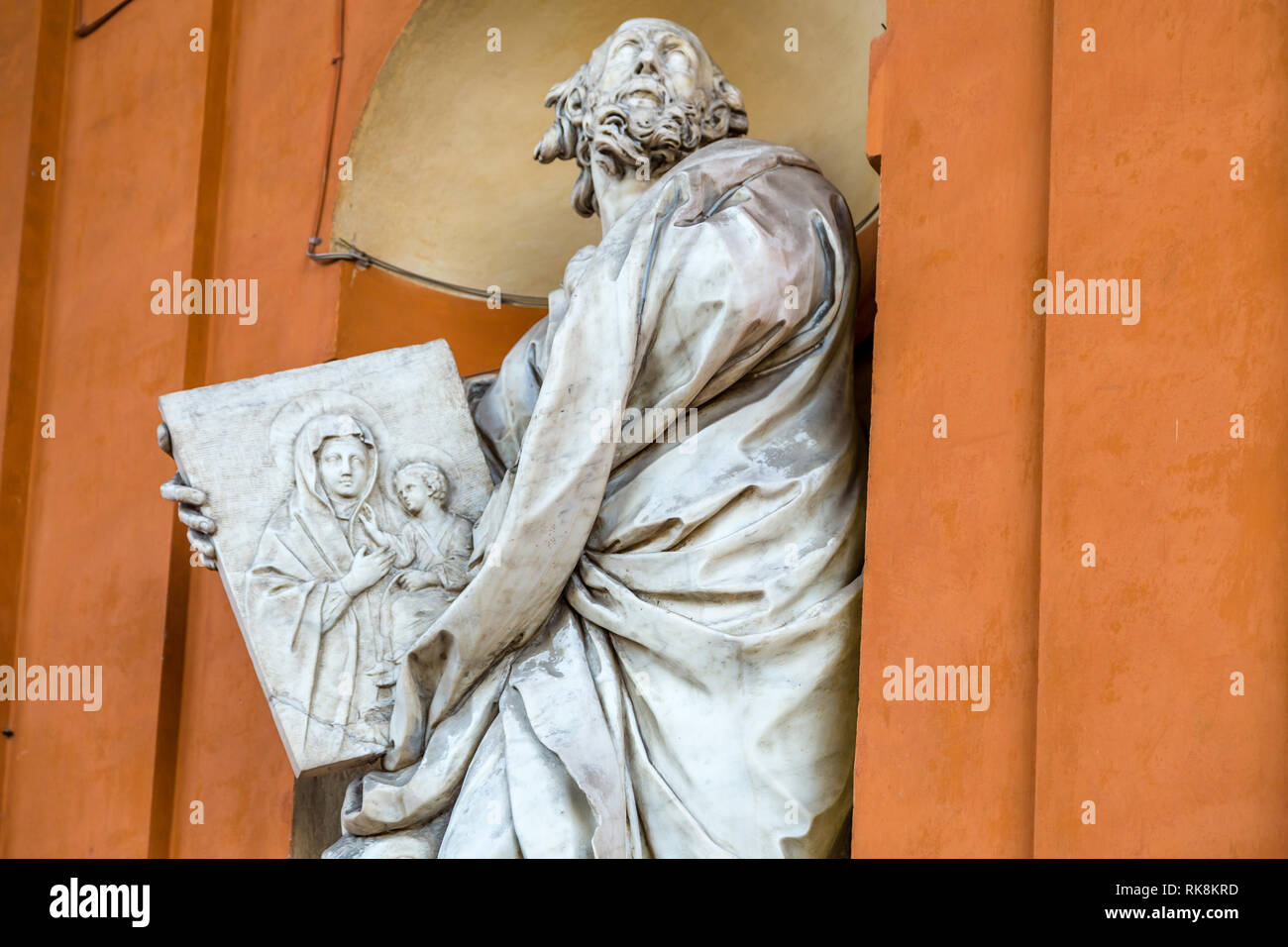 BOLOGNA, ITALY - DECEMBER 15, 2018: sunlight is enlightening statue of ...