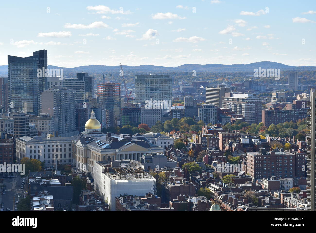 View of the Boston skyline seen from the Avalon North Station roof deck ...