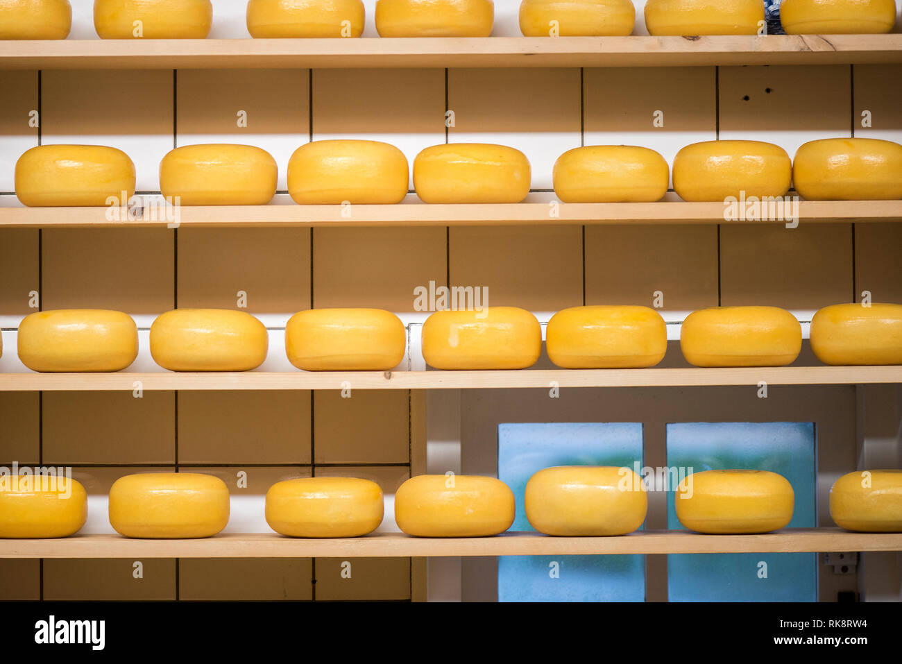 Dutch yellow cheese is on the shelves in the store Stock Photo - Alamy
