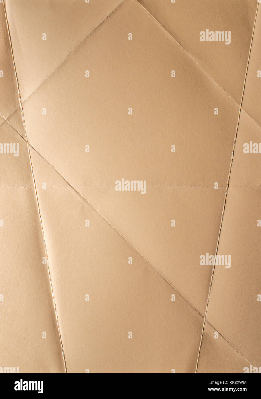 Folded orange pantone color paper. Pastel tones. Hard natural light ...