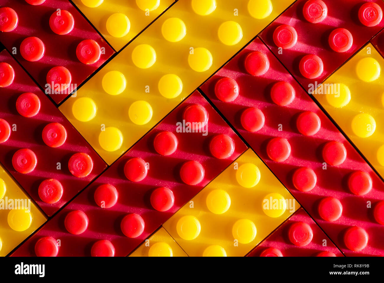 Plastic geometric cubes. Construction toy solid background from ...