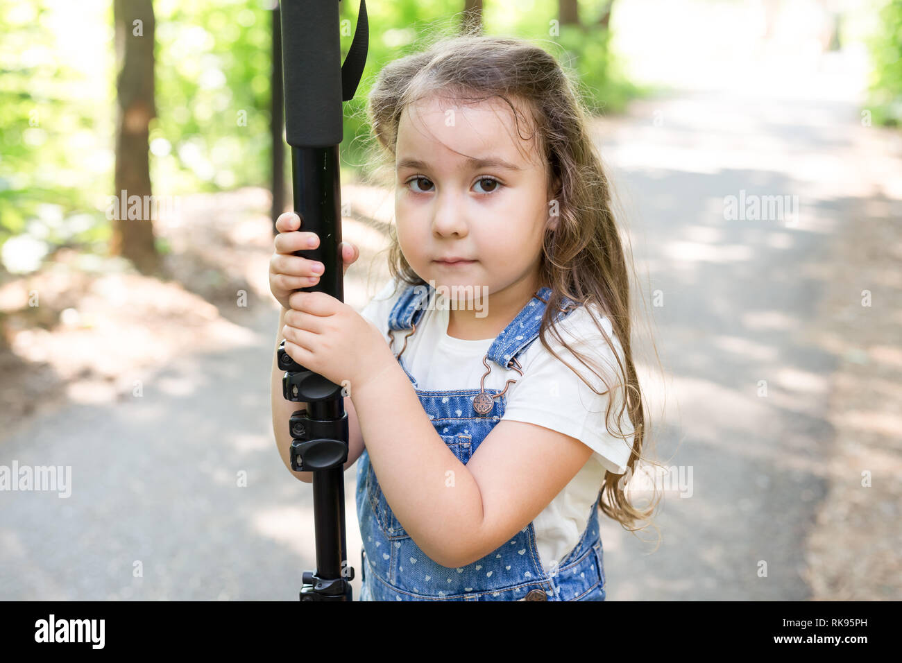 Hobby, profession, children and photographer concept - child with ...