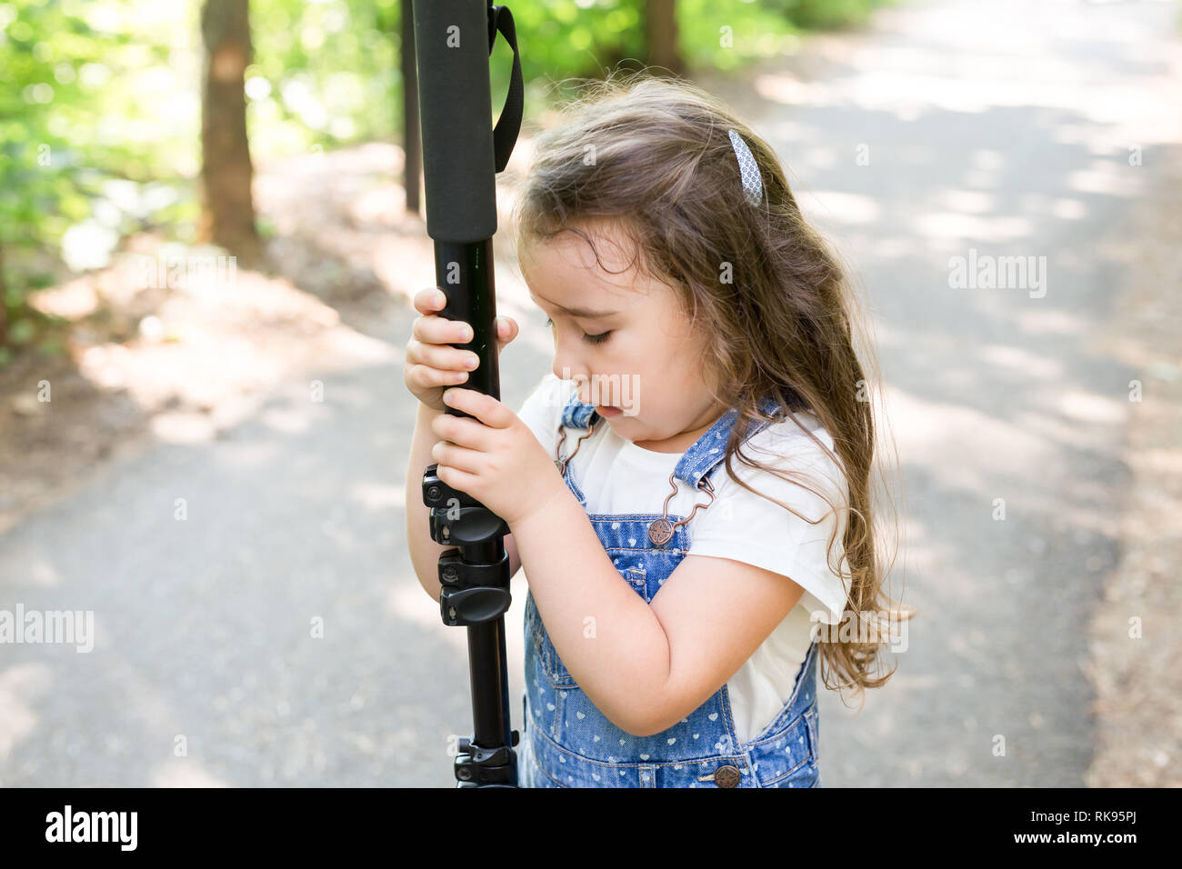 Hobby, profession, children and photographer concept - child with ...