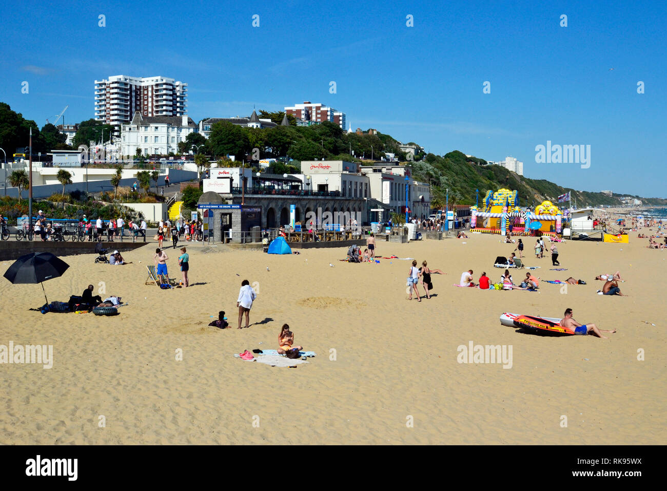 People relaxing on the beach at Bournemouth, England, UK Stock Photo ...