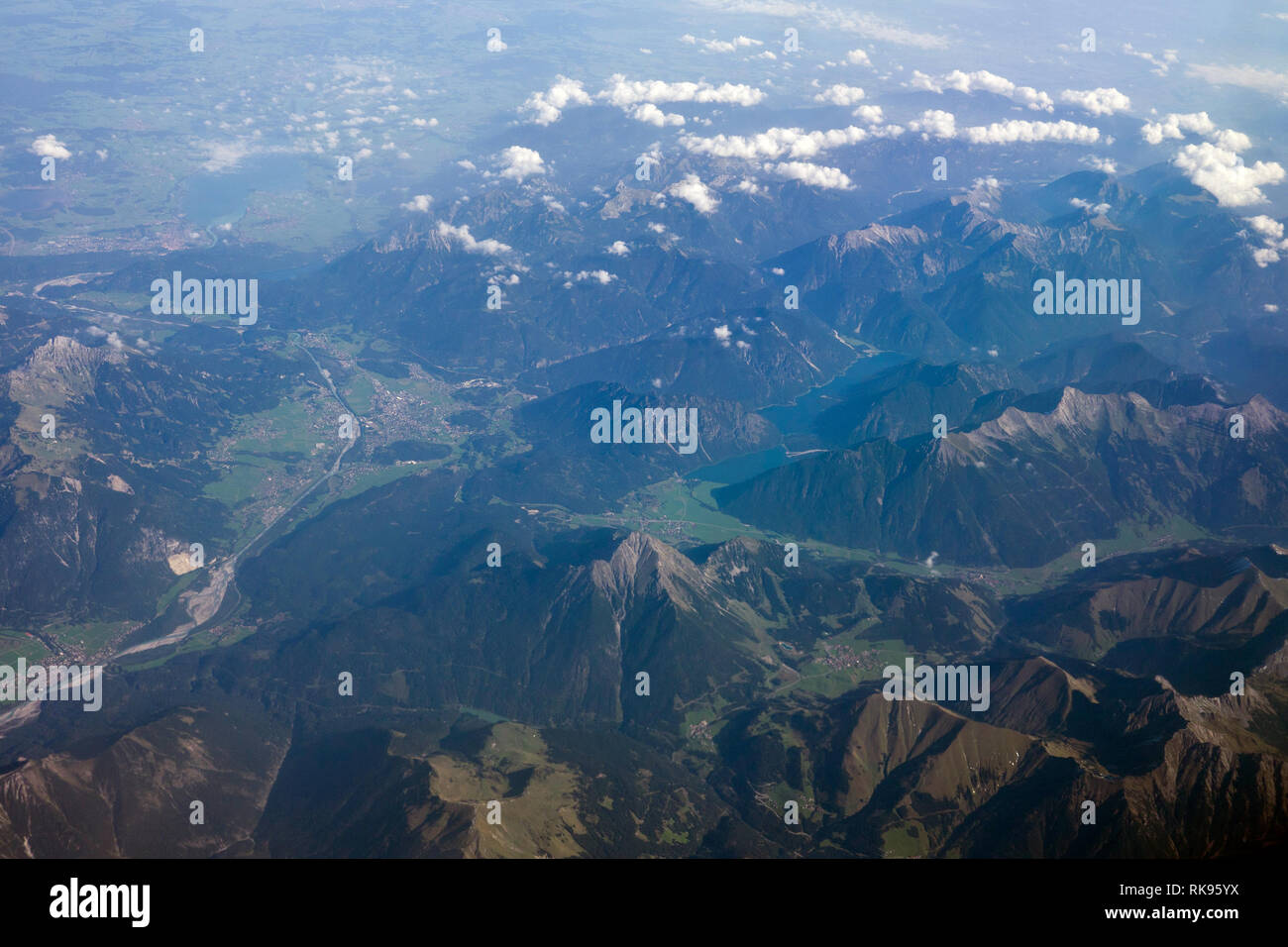 Aerial view of Alps mountains seen from an airplane Stock Photo - Alamy