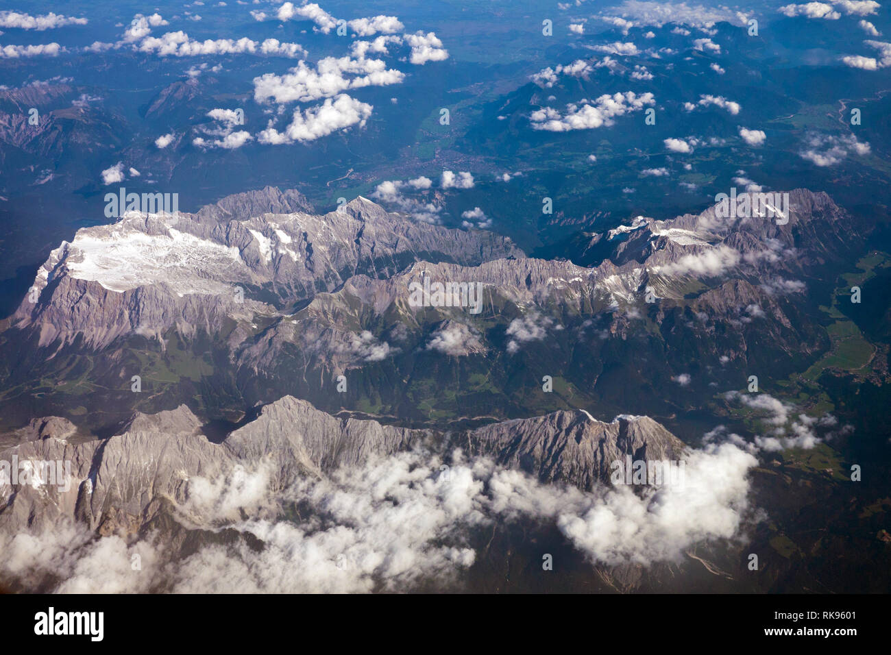 Aerial view of Alps mountains with snow on mountain peaks seen from an ...