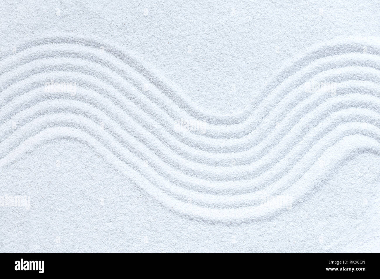 Zen pattern in white sand Stock Photo - Alamy