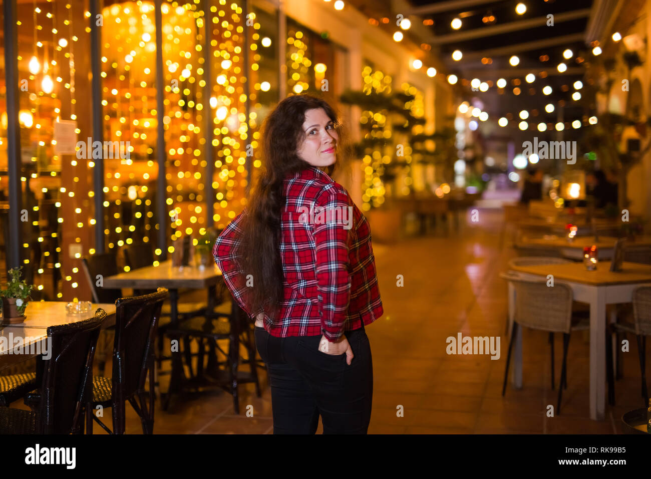 Nightlife, party and people concept - Beautiful young woman is have fun ...