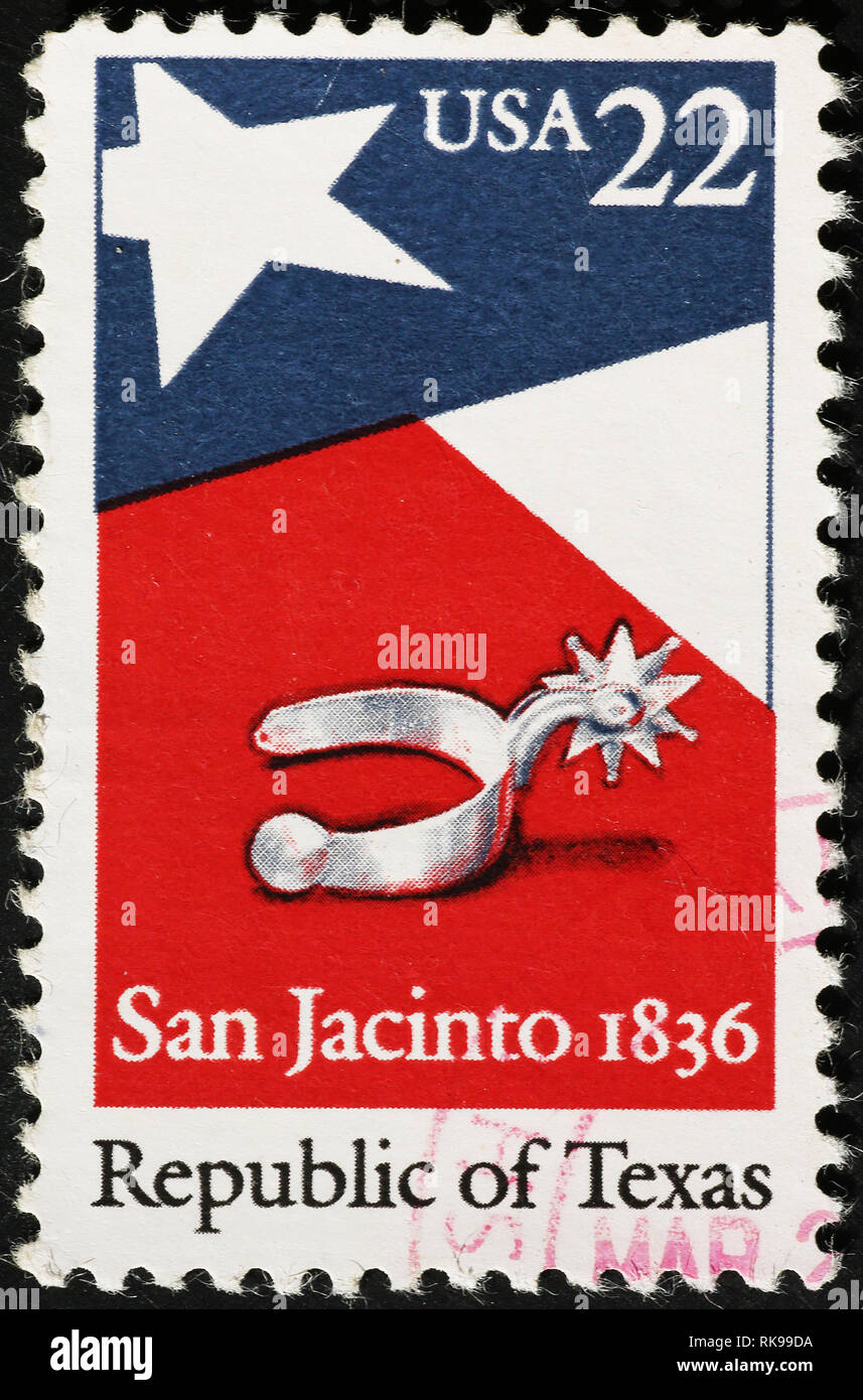 Flag of Texas and spur on american stamp Stock Photo - Alamy