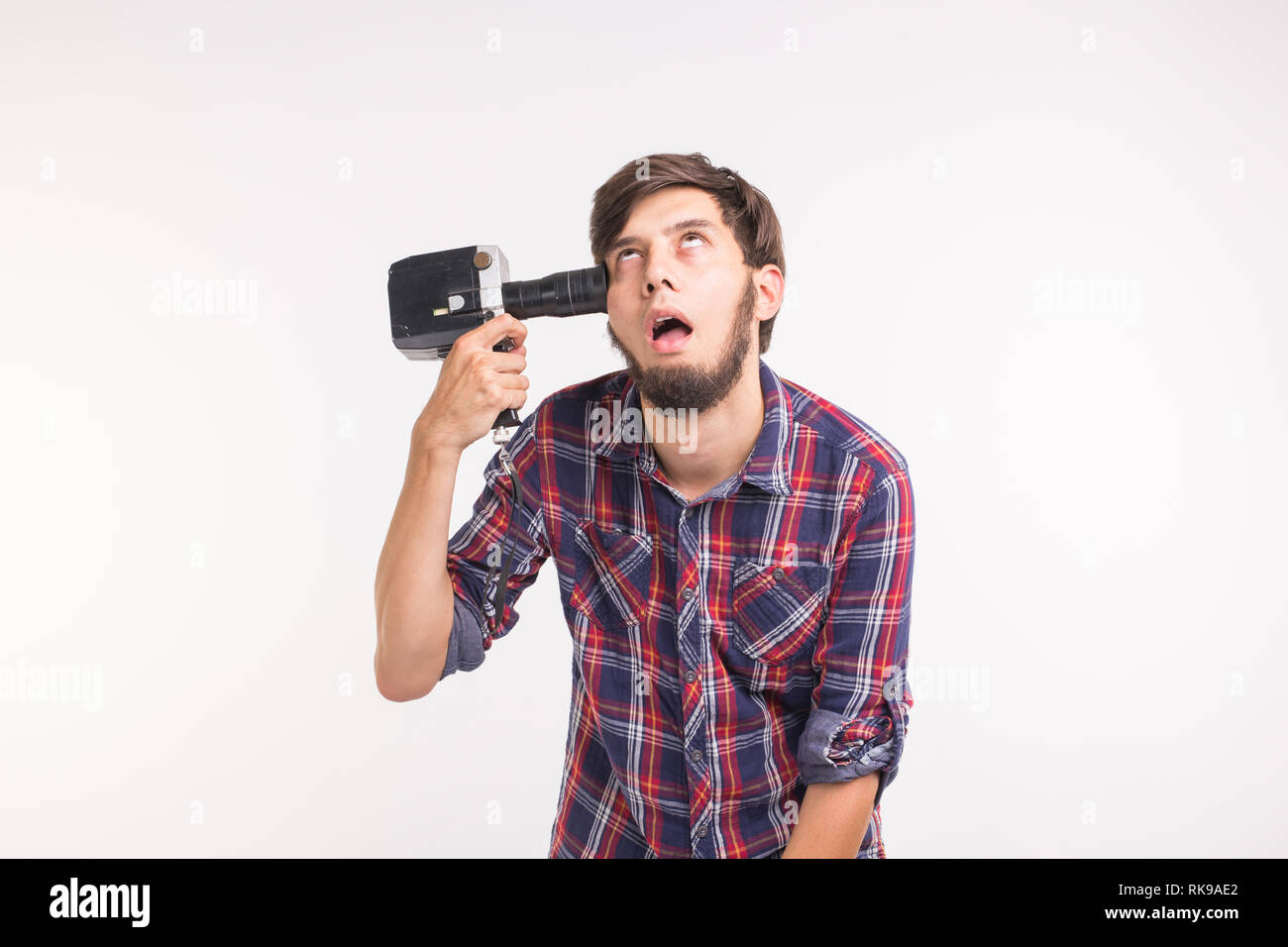 Joke, photo and gesture concept - young funny silly man posing with ...