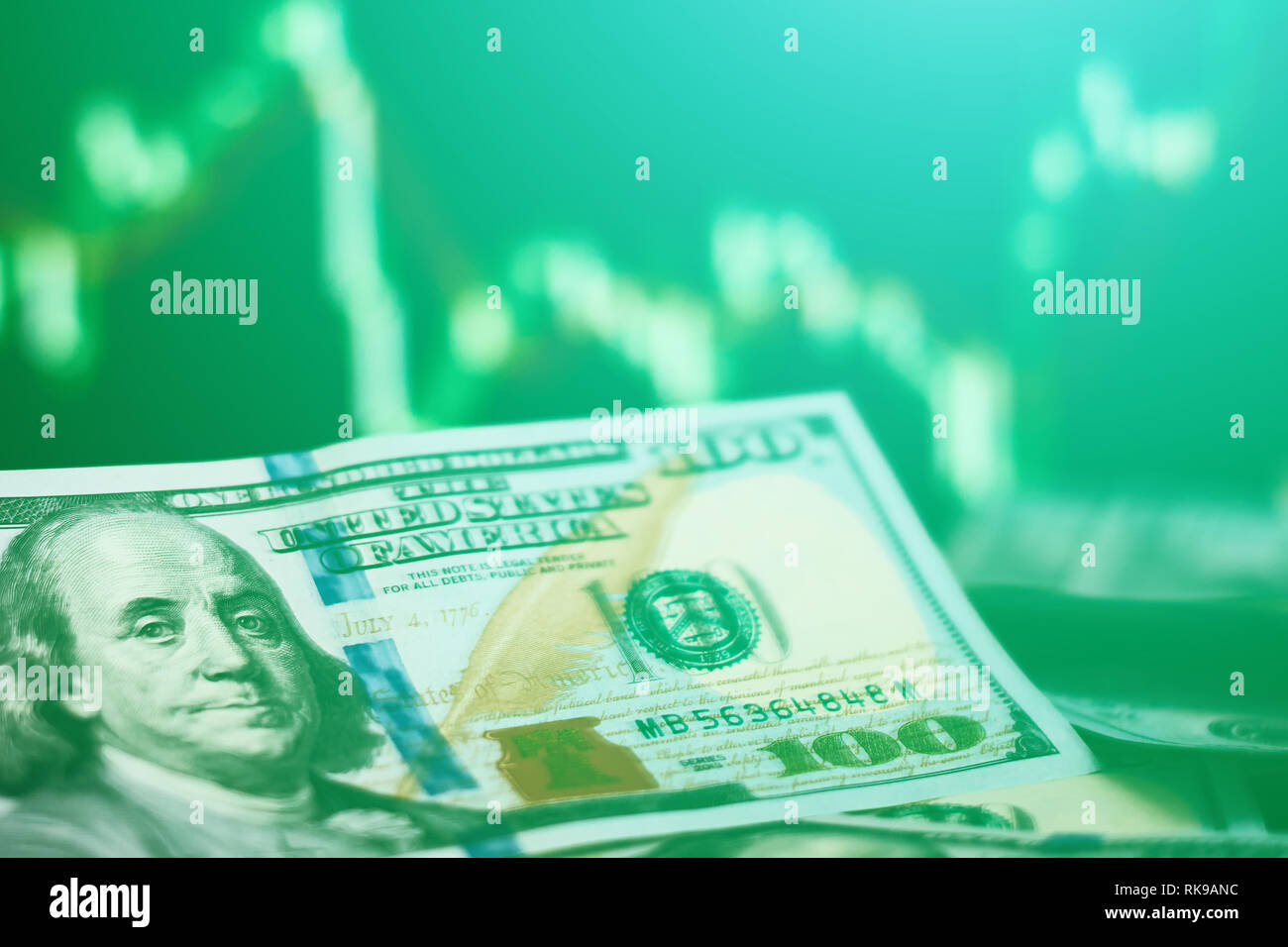US dollar bills on background with forex market. Trading and financial ...