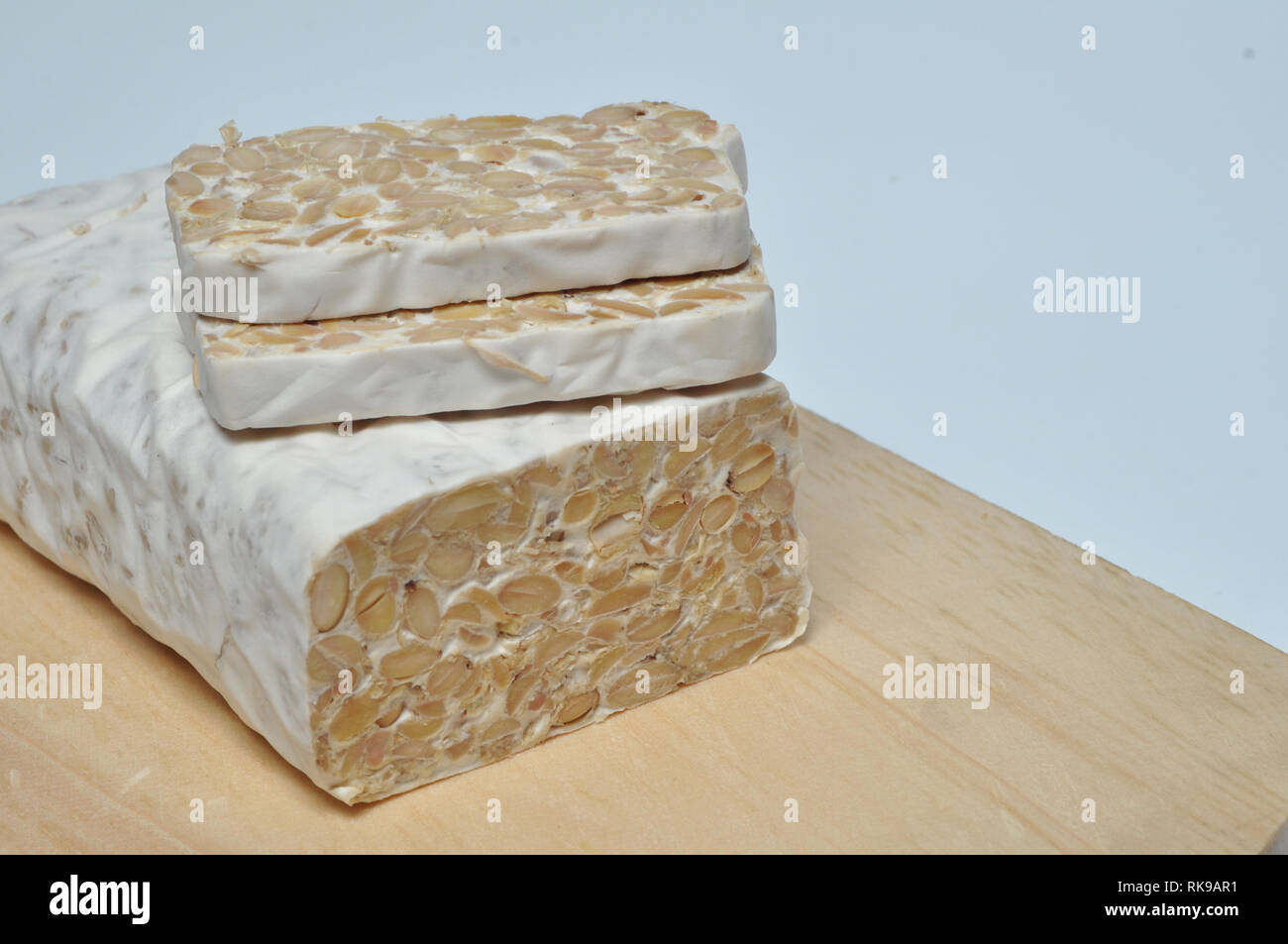 Tempeh indonesia traditional food Stock Photo - Alamy