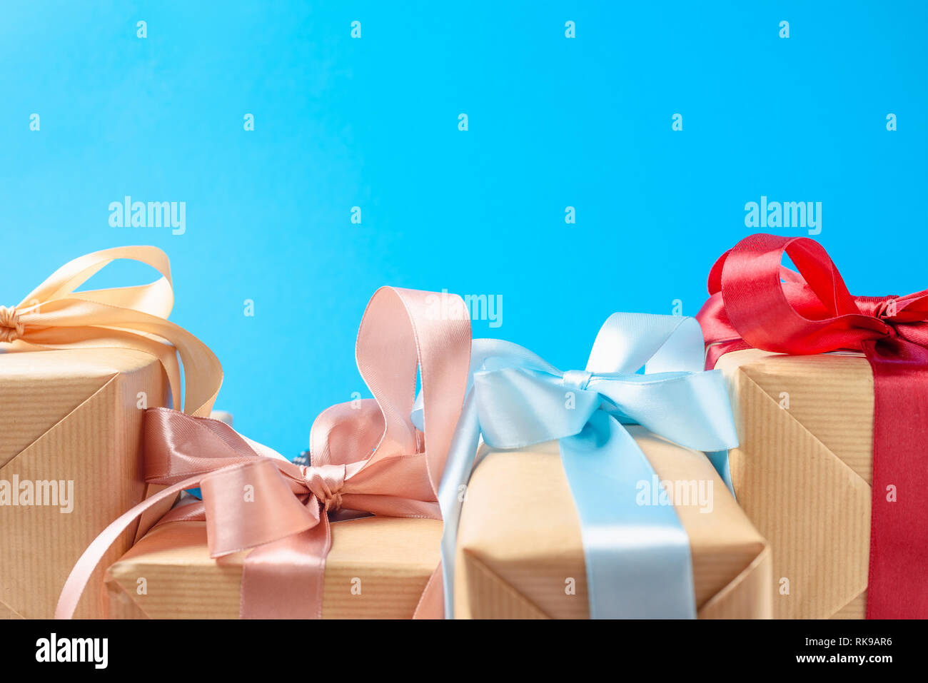 a lot of gift boxes on blue background Stock Photo - Alamy