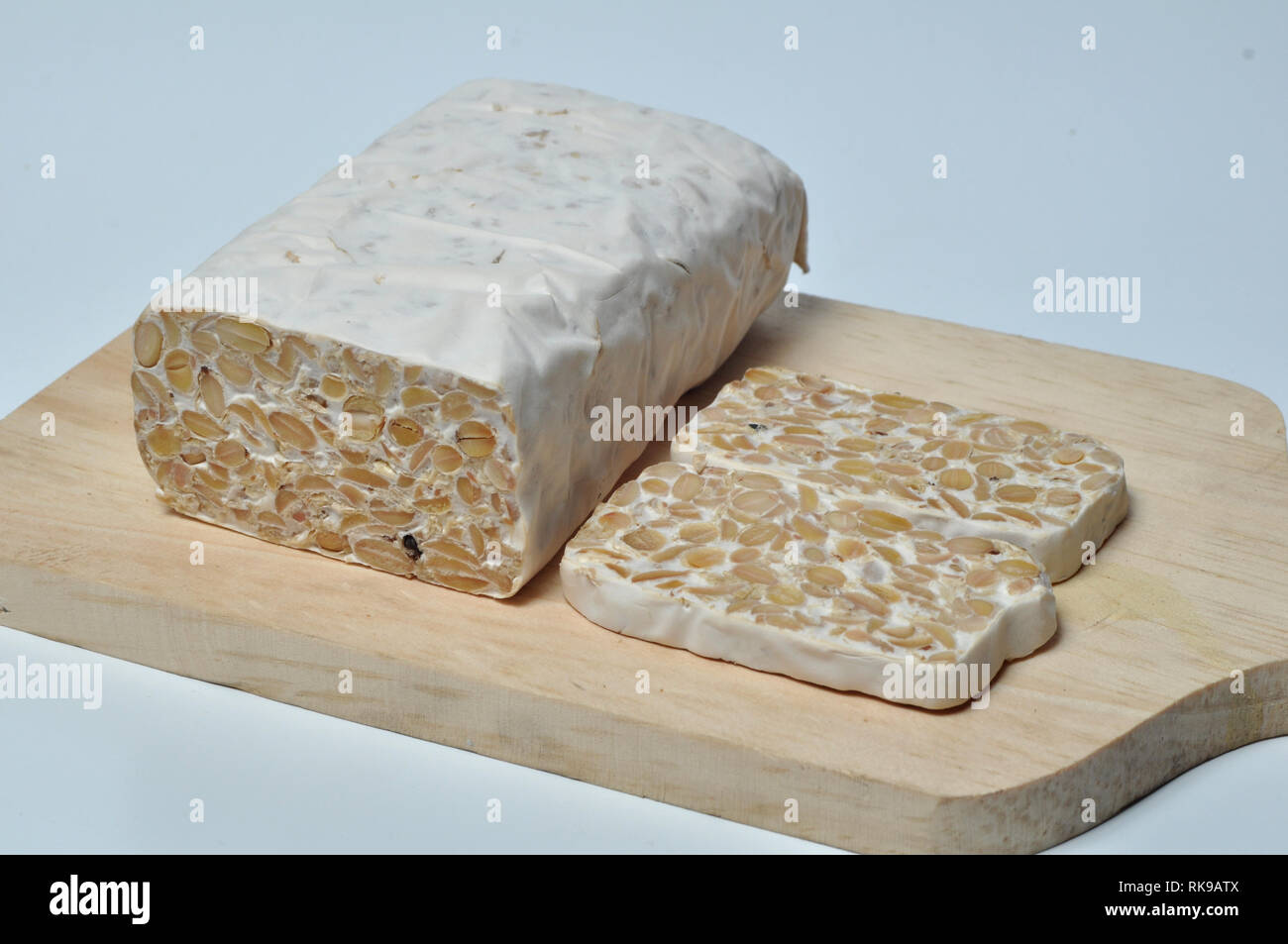 Tempeh indonesia traditional food Stock Photo - Alamy