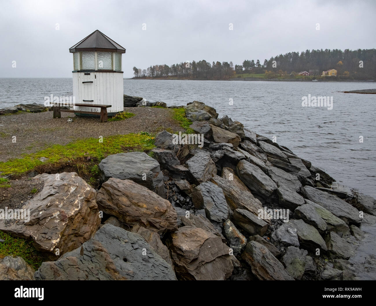 Small white wooden lighthouse in Vollen, Norway Stock Photo - Alamy