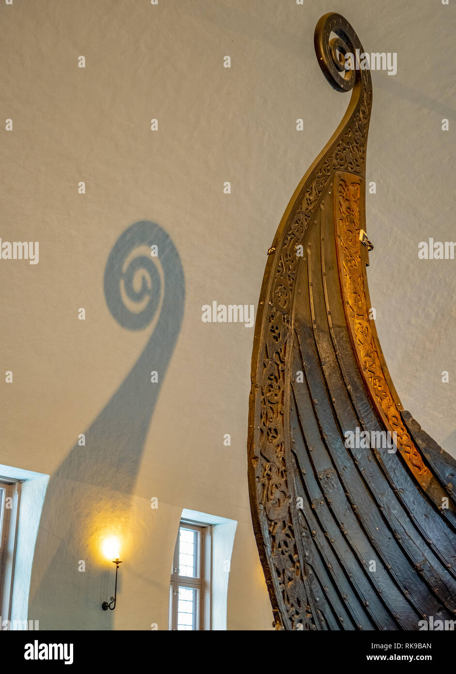 Viking ship tail and its shadow, located in the Viking Ship Museum in ...