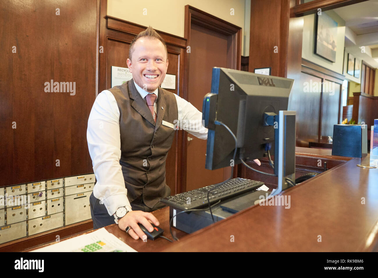 Luxury hotel lobby staff hi-res stock photography and images - Alamy
