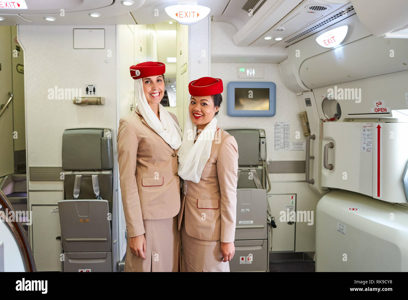HONG KONG - APRIL 09, 2016: Emirates crew members on board of Airbus ...