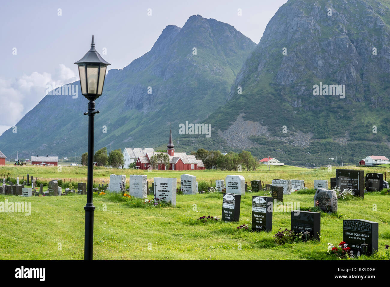 Graveyard of Flakstad, Flakstad church in the back, red wooden building ...