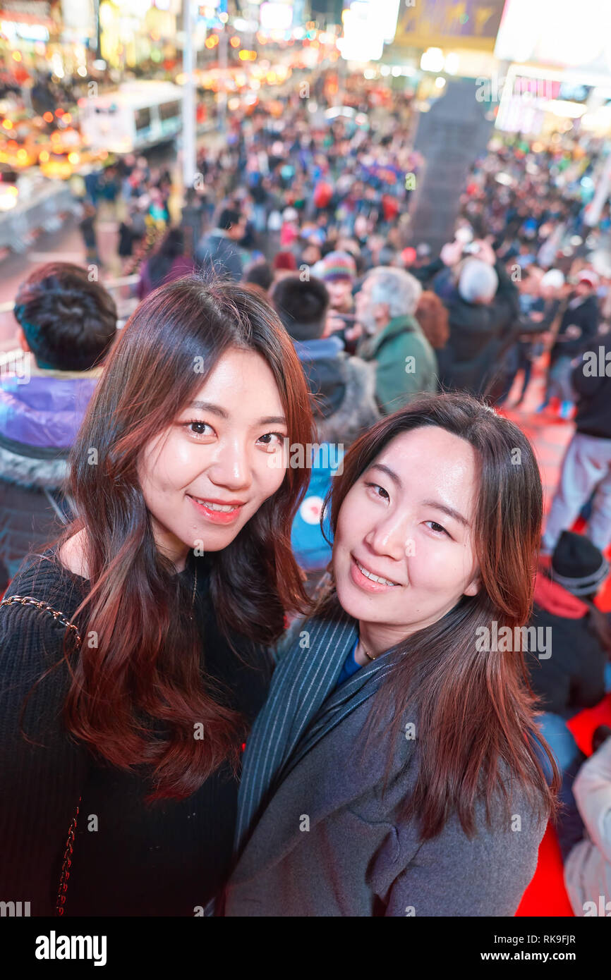 NEW YORK - CIRCA MARCH, 2016: outdoor portrait of young women at Times ...