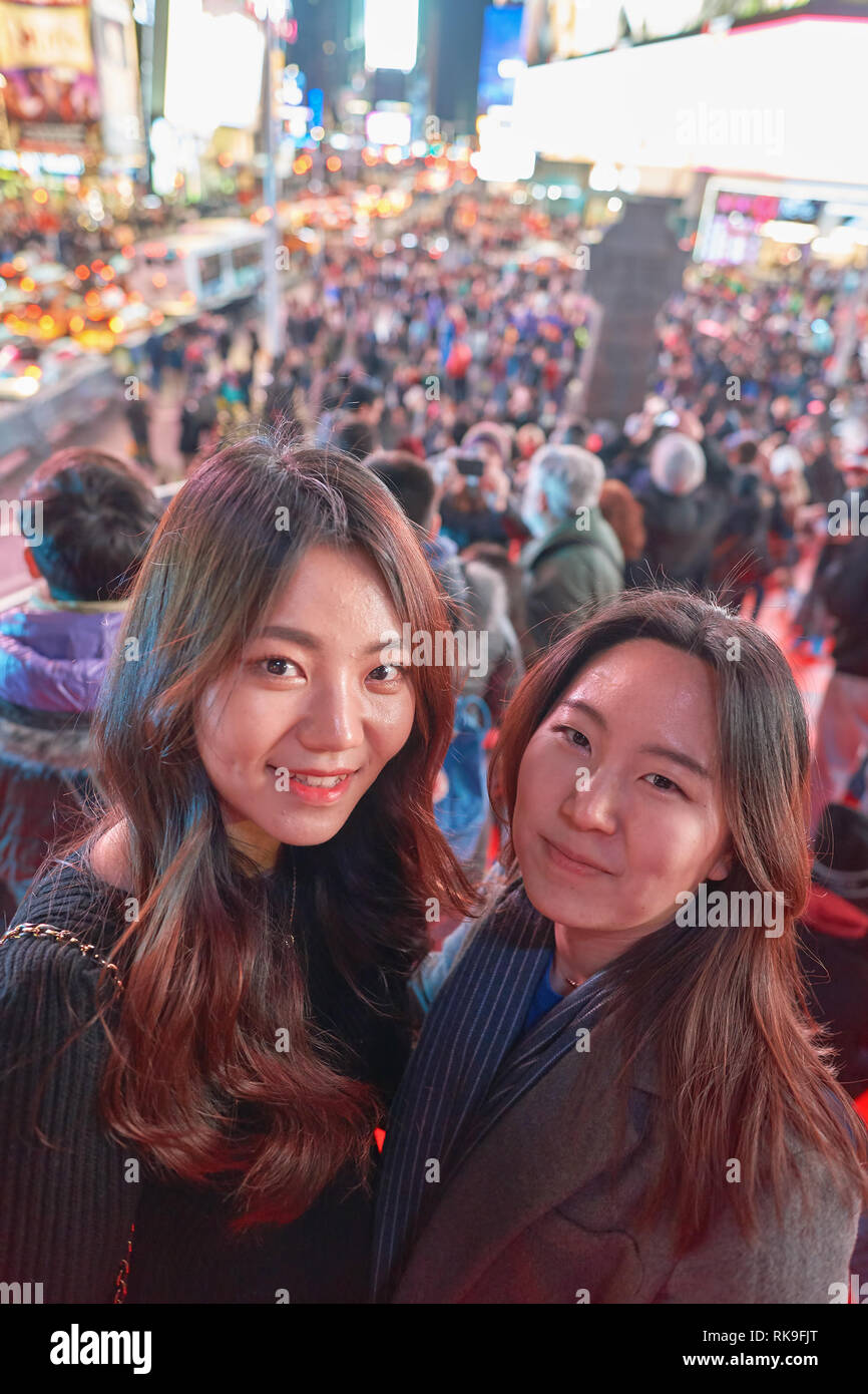 NEW YORK - CIRCA MARCH, 2016: outdoor portrait of young women at Times ...