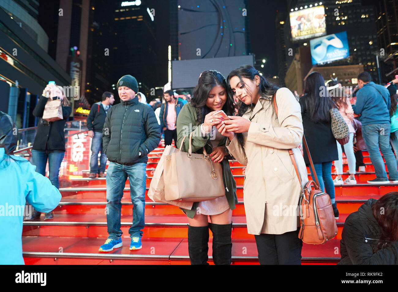 NEW YORK - CIRCA MARCH, 2016: outdoor portrait of young women at Times ...
