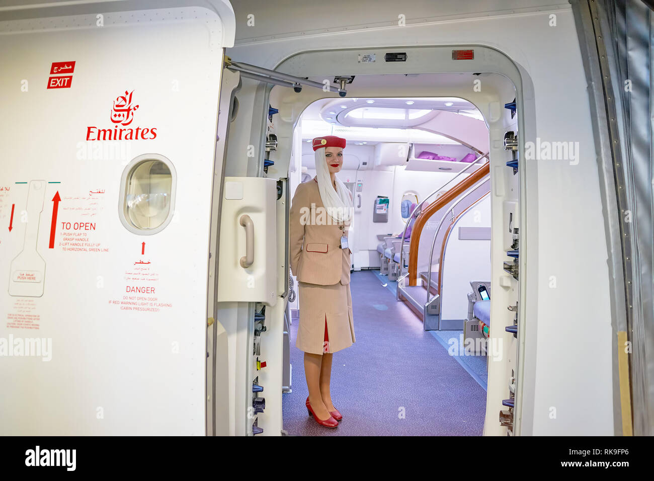 DUBAI, UAE - CIRCA MAY, 2016: Emirates crew member on board of A380 ...