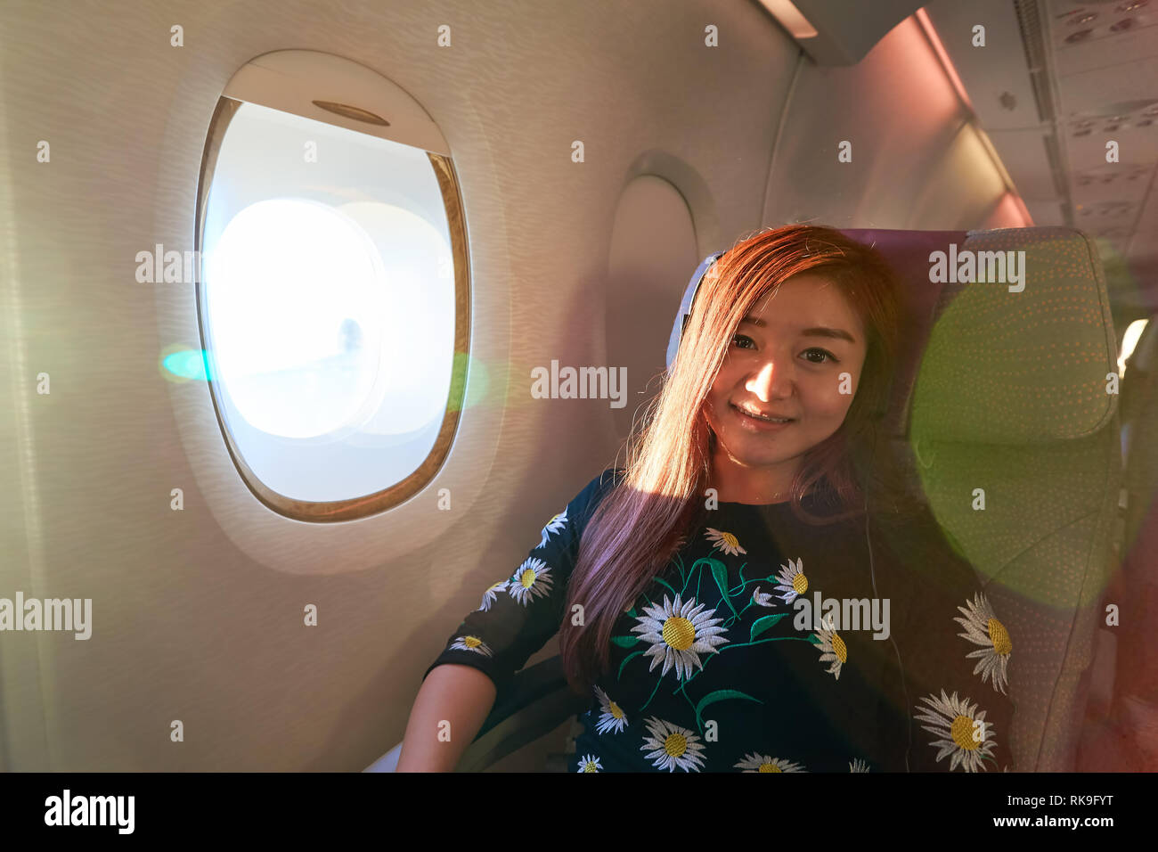 HONG KONG - MARCH 08, 2016: passenger in Emirates Airbus A380. The ...