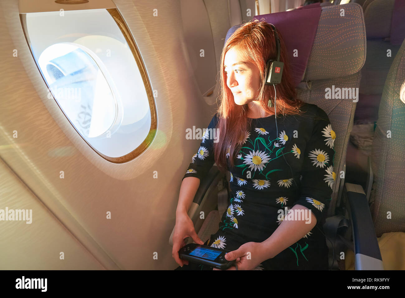 HONG KONG - MARCH 08, 2016: passenger in Emirates Airbus A380. The ...