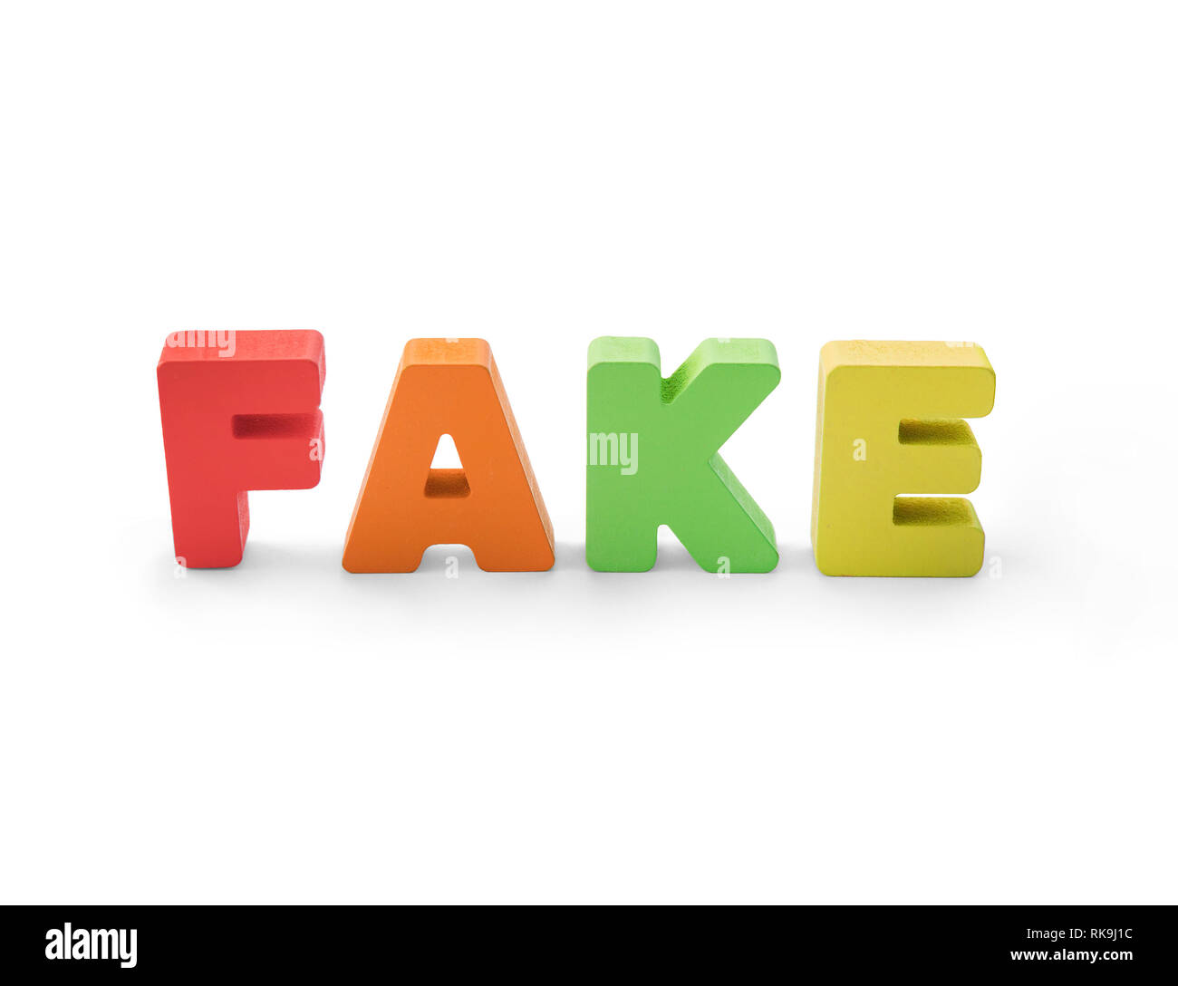 Wooden letters on white background - concept of fake information ...