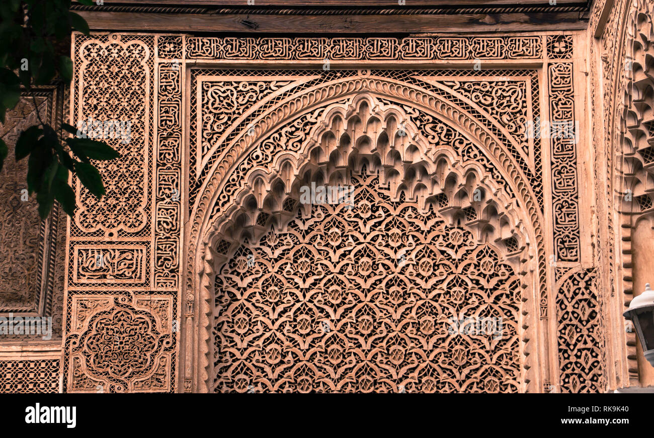 Islamic calligraphy and colorful geometric patterns a Morocco Stock ...