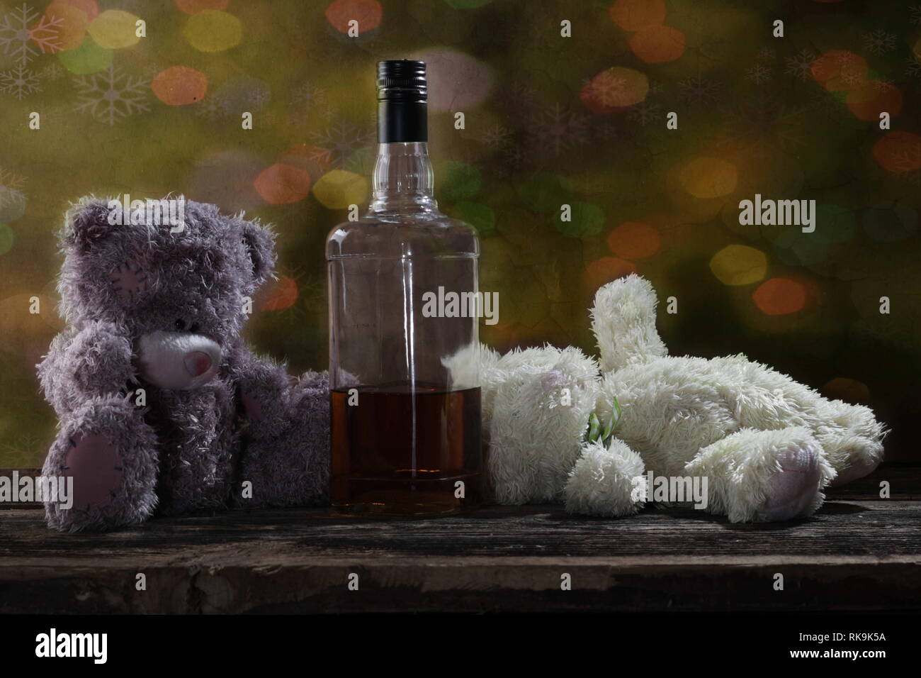 Two Teddy Bears drunk bourbon whiskey at Christmas Stock Photo - Alamy