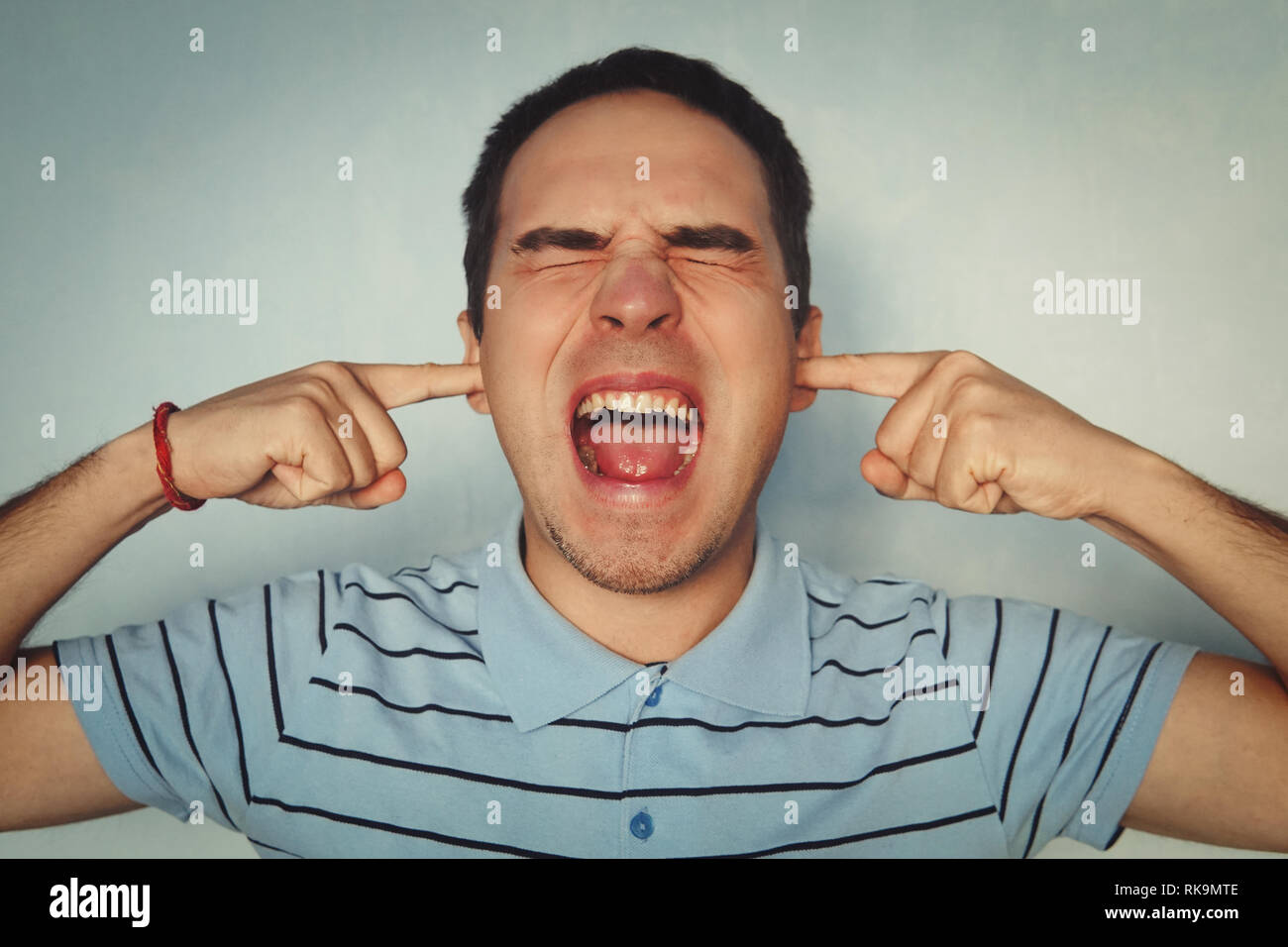 Hearing loud hi-res stock photography and images - Alamy