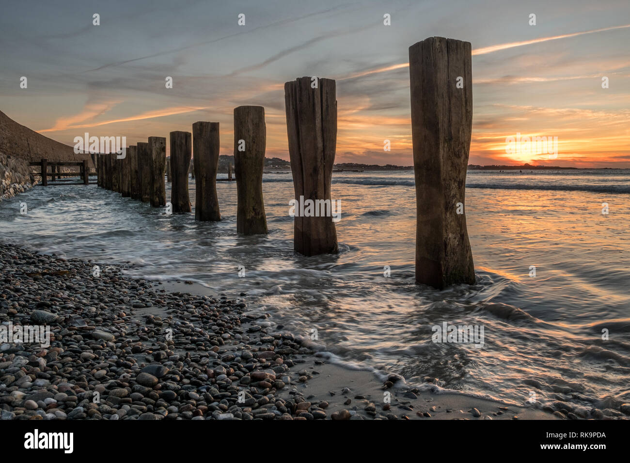 Beach sea wall groynes hi-res stock photography and images - Alamy