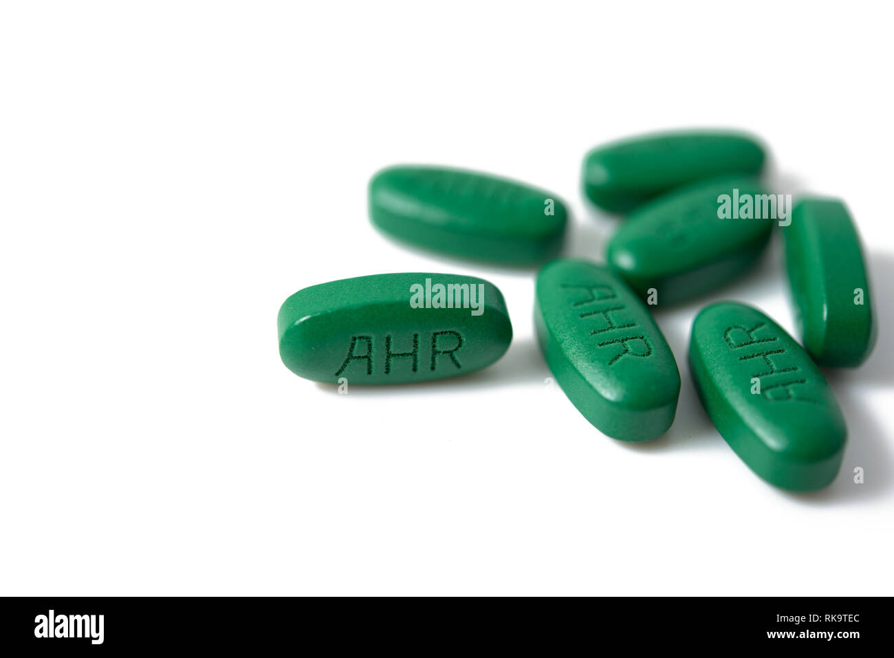 green tablets vitamins, dietary supplement pills Stock Photo - Alamy