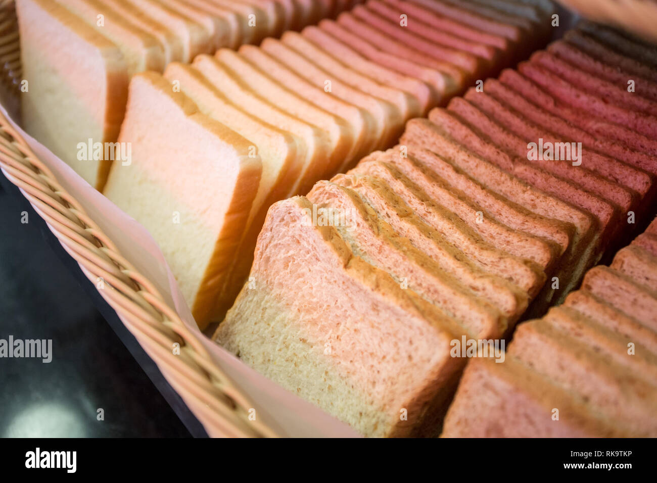 row of sliced bread in basket Stock Photo - Alamy