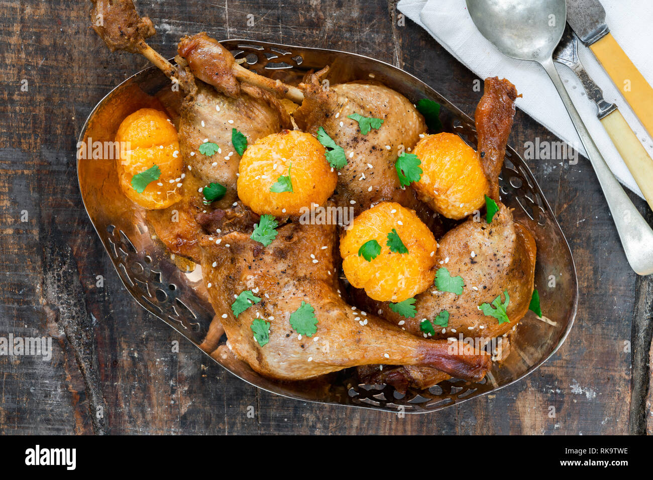 Duck tagine with clementines - top view Stock Photo - Alamy