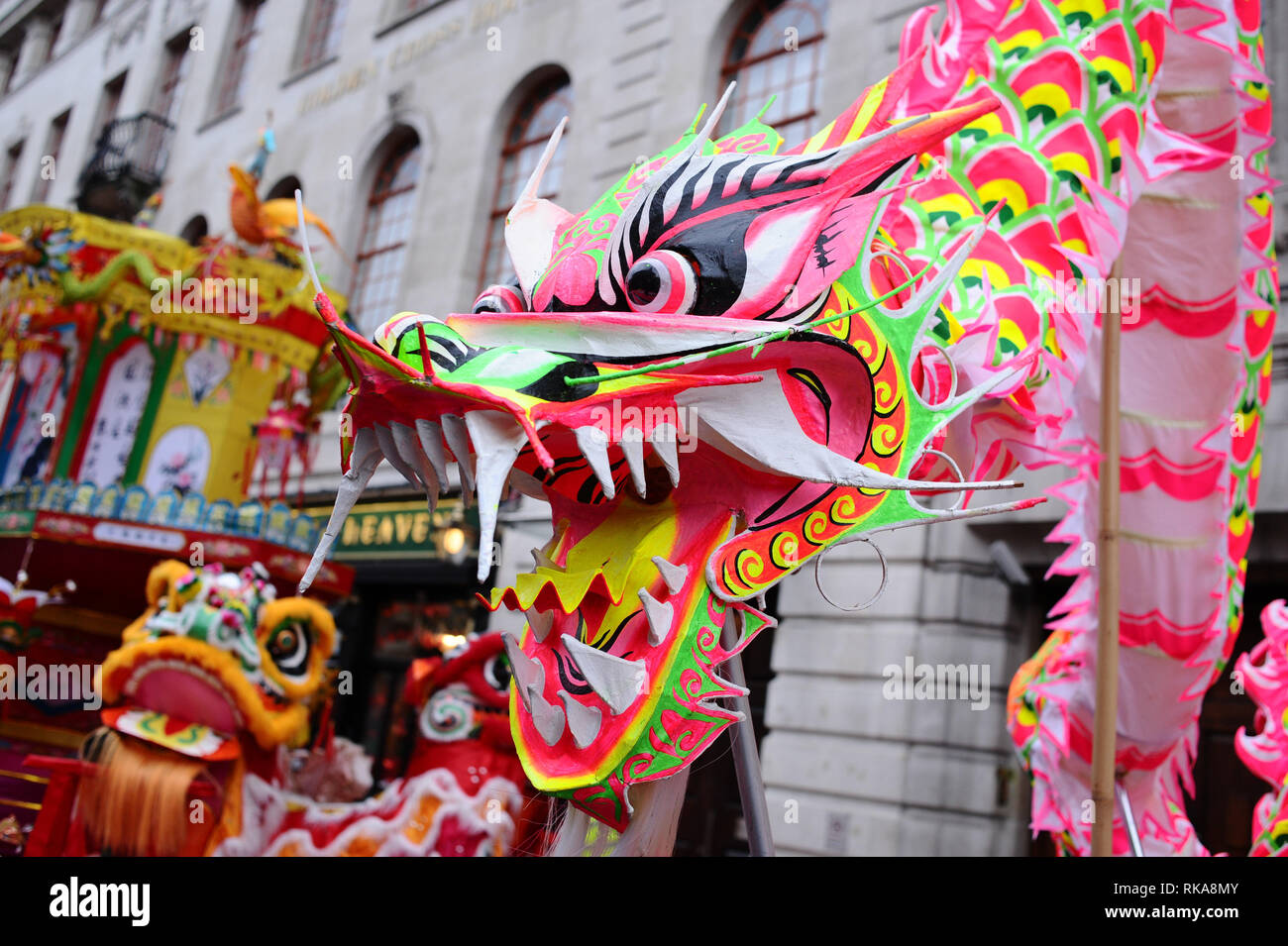 London, UK. 10th Feb, 2019. A dragon prop seen standing on a float on ...