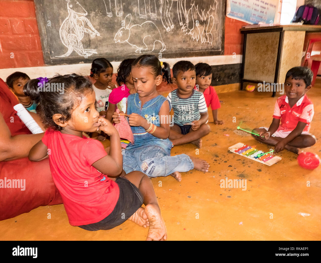Poor indian children playing toy hi-res stock photography and images ...
