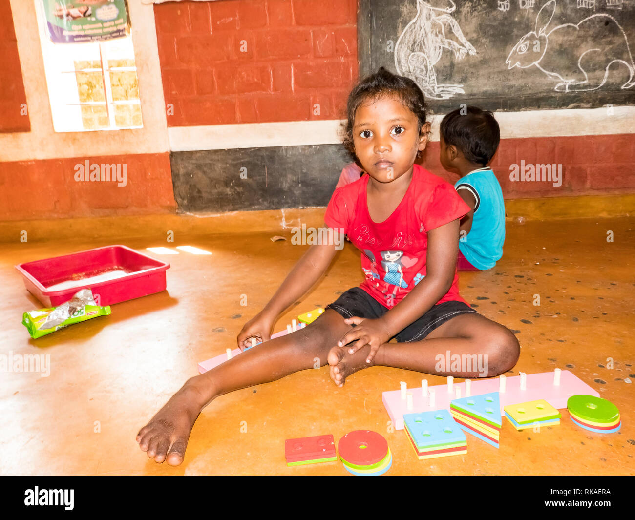 PUDUCHERY, INDIA - DECEMBER Circa, 2018. Interior of poor kids playing ...