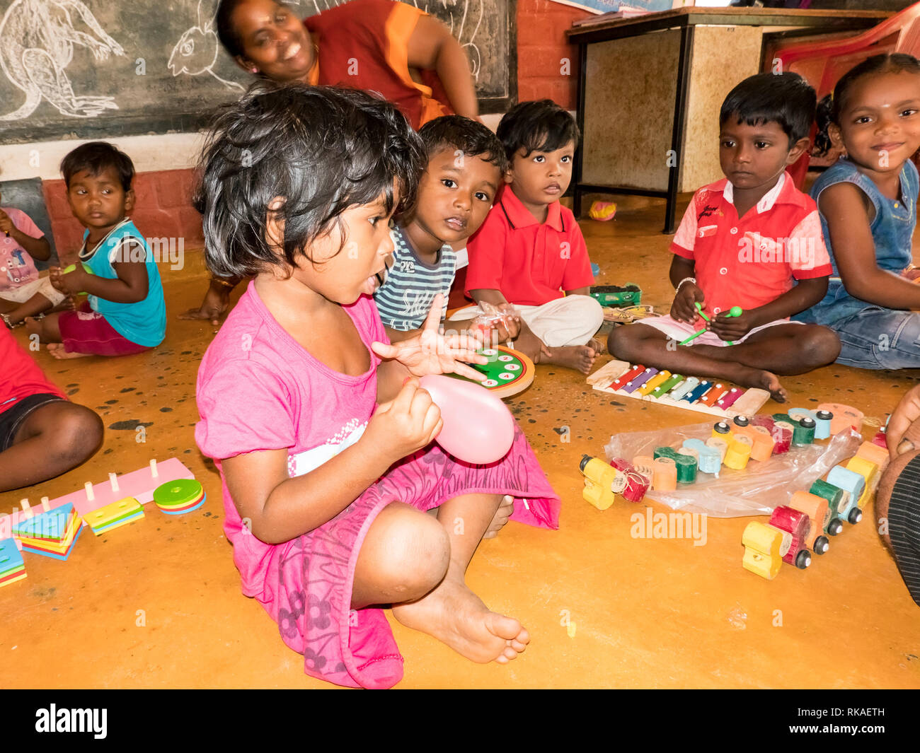 PUDUCHERY, INDIA - DECEMBER Circa, 2018. Interior of poor kids playing ...